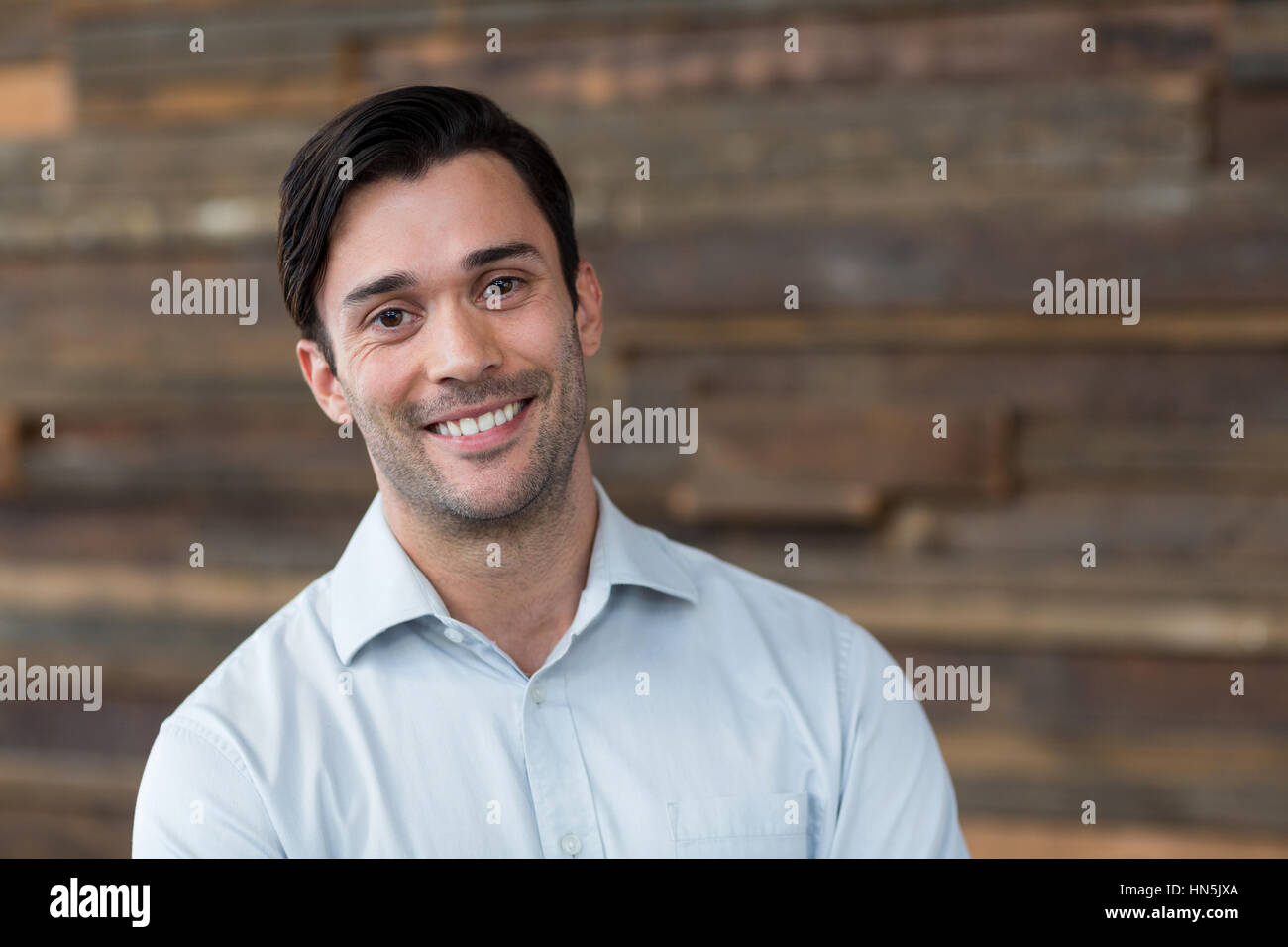 Portrait of male business executive in office Stock Photo - Alamy