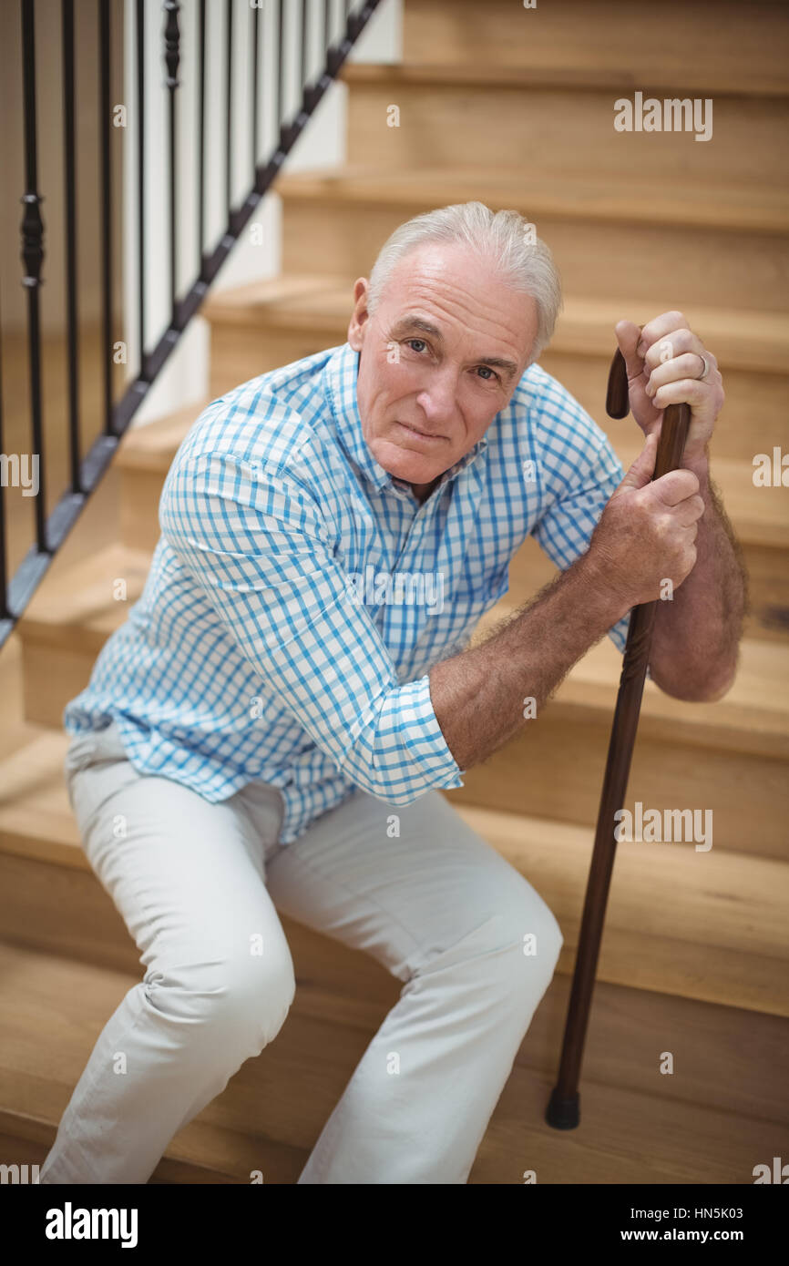 Senior man stairs rail hi-res stock photography and images - Alamy