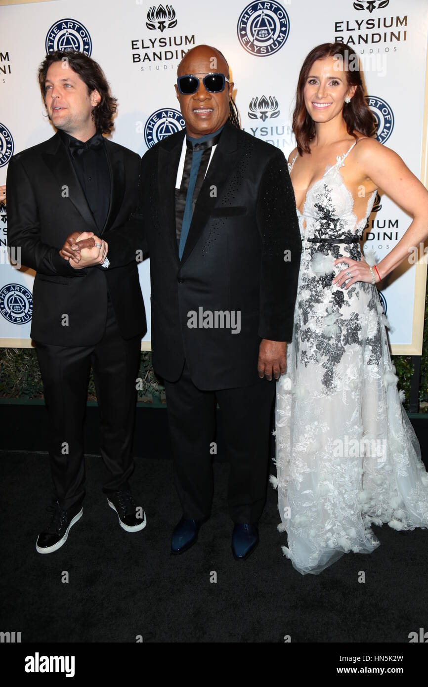 Adam Westbrook, Stevie Wonder and Kaily Westbrook attending The Art of ...