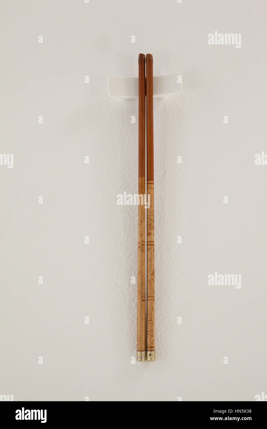 Pair of patterned chopsticks against white background Stock Photo - Alamy