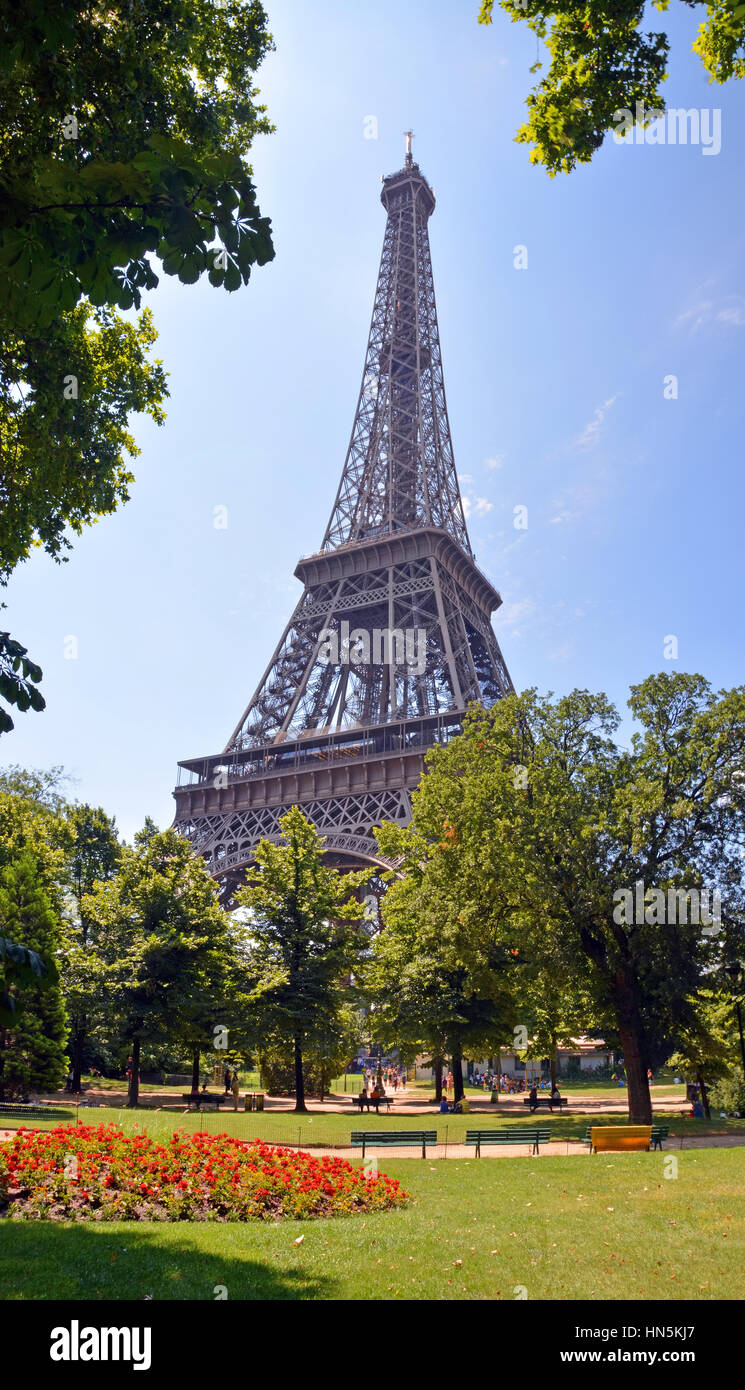A vertical panoramic view of the Iconic Eiffel Tower and gardens on a ...