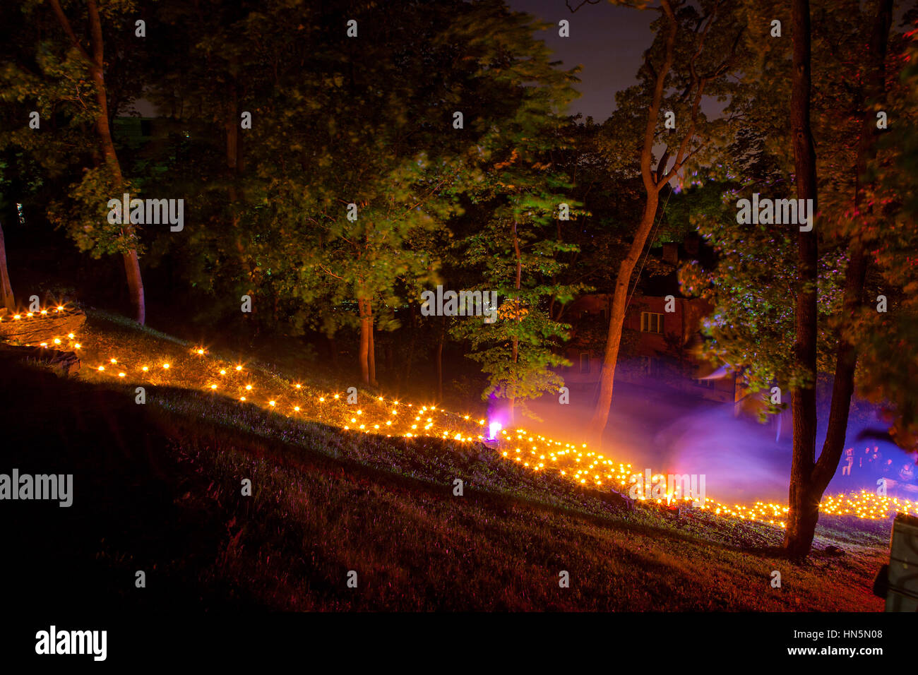 Candle hanging in tree outdoors hi-res stock photography and images - Alamy