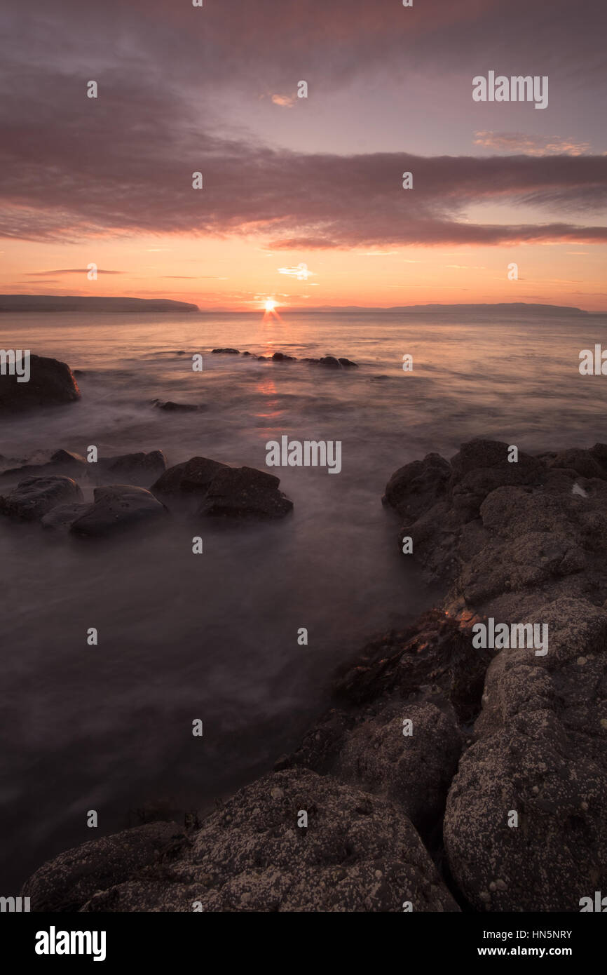 Sunset at the coast overlooking Portstewart Strand in Northern Ireland ...