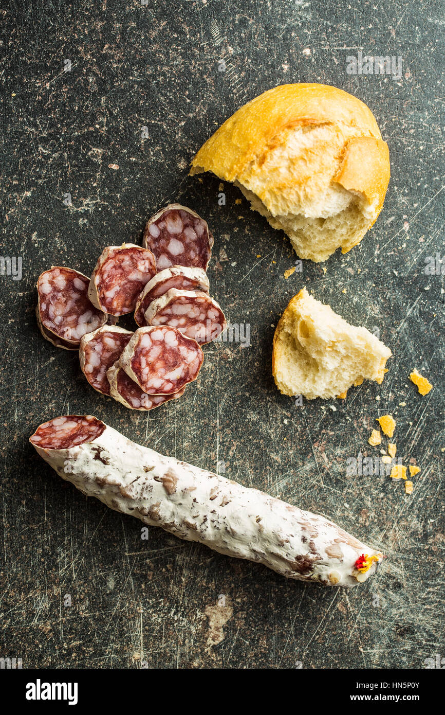 Tasty sliced salami with white mold Stock Photo - Alamy