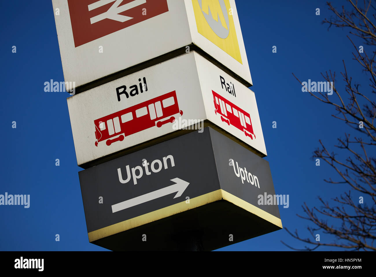Blue sky on a sunny day, Upton railway station sign in Wallasey ...