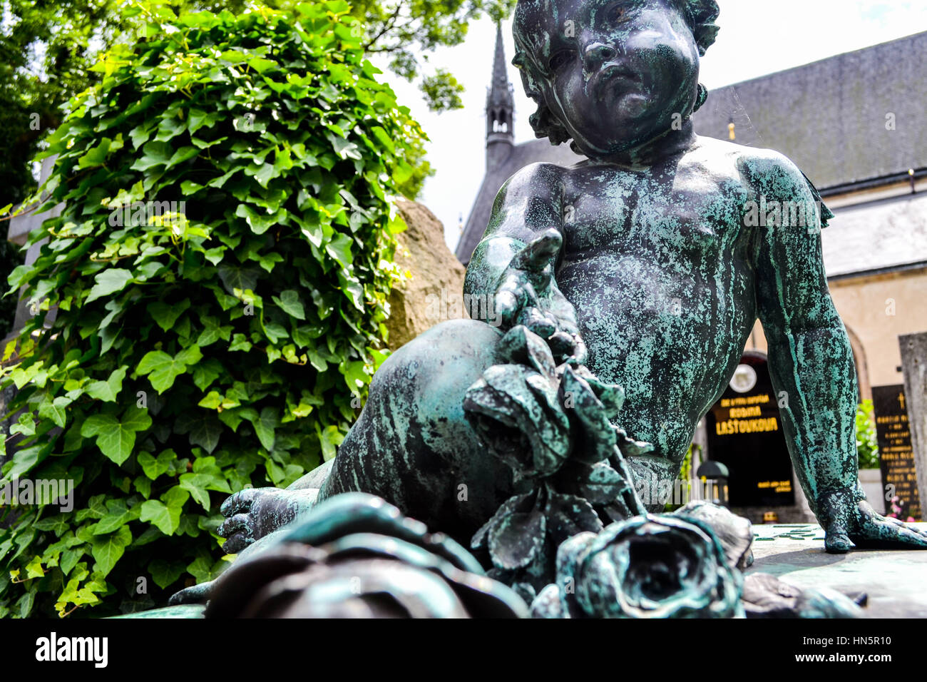 Child's grave at Vyšehrad Cemetery in Prague Stock Photo - Alamy