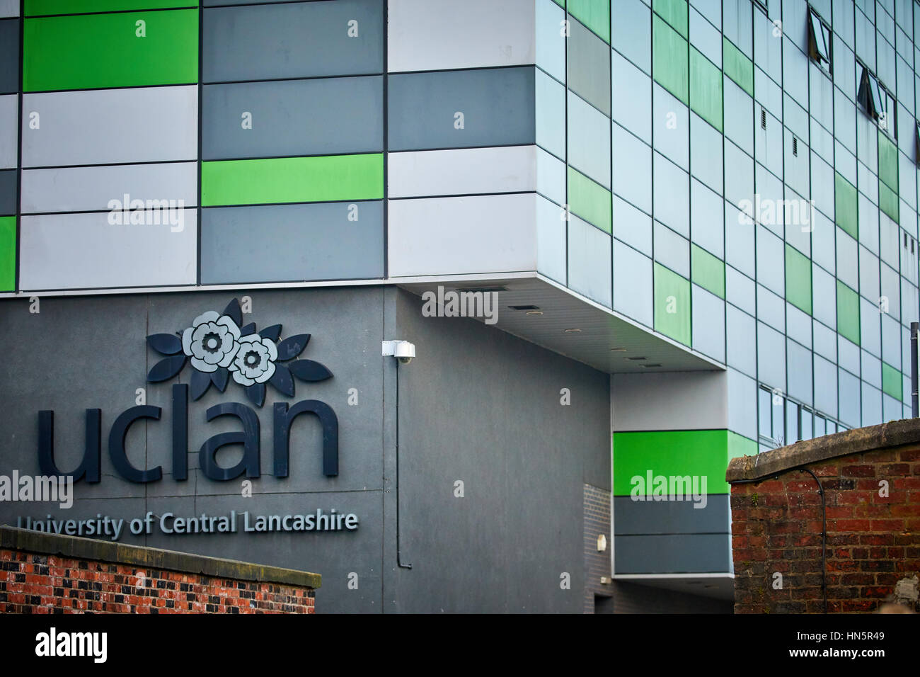 Student walking into Exterior building of the Preston Campus of UCLAN ...
