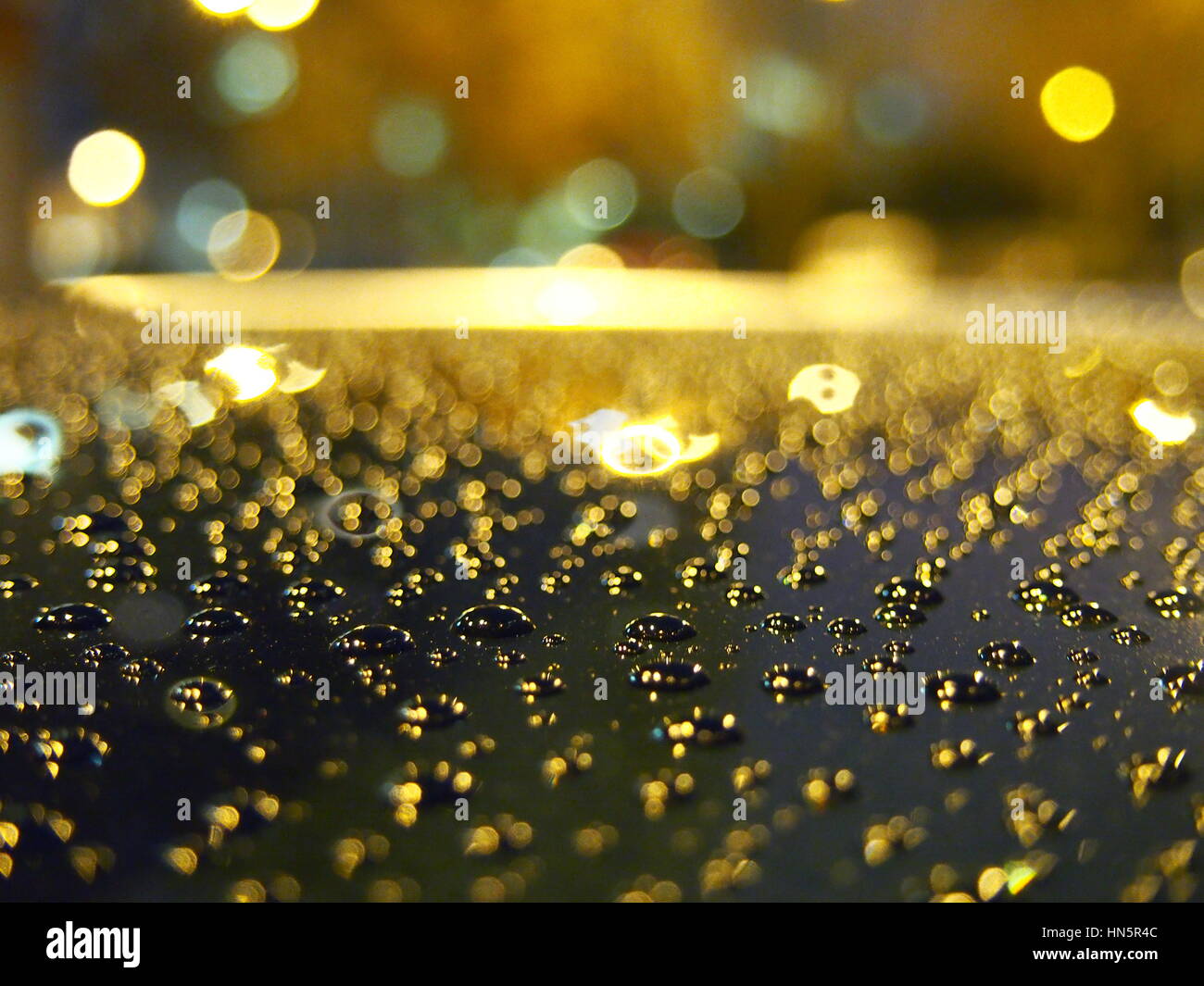 Rain drops close up and reflection of light Stock Photo - Alamy