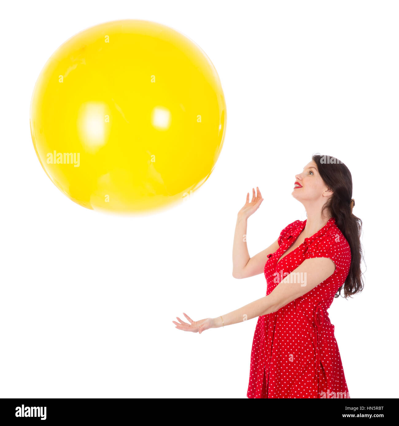 Catching a balloon Cut Out Stock Images & Pictures - Alamy