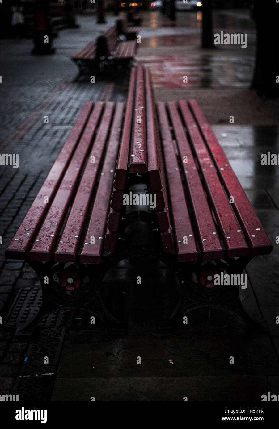 Red Benches In Town Square Stock Photo - Alamy