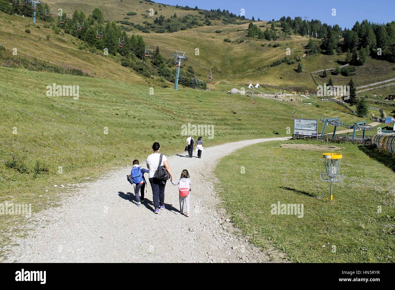 people walk on a path in the mountains Stock Photo - Alamy
