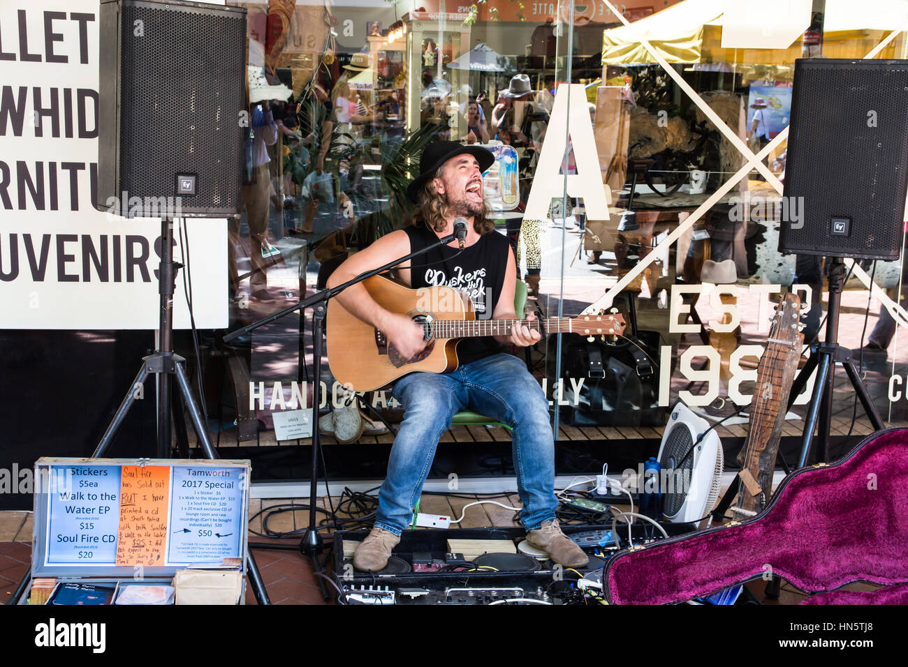 Male street busker guitar singing hi-res stock photography and images ...