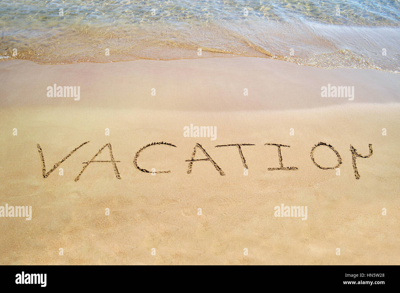 vacation note written on the beach Stock Photo - Alamy
