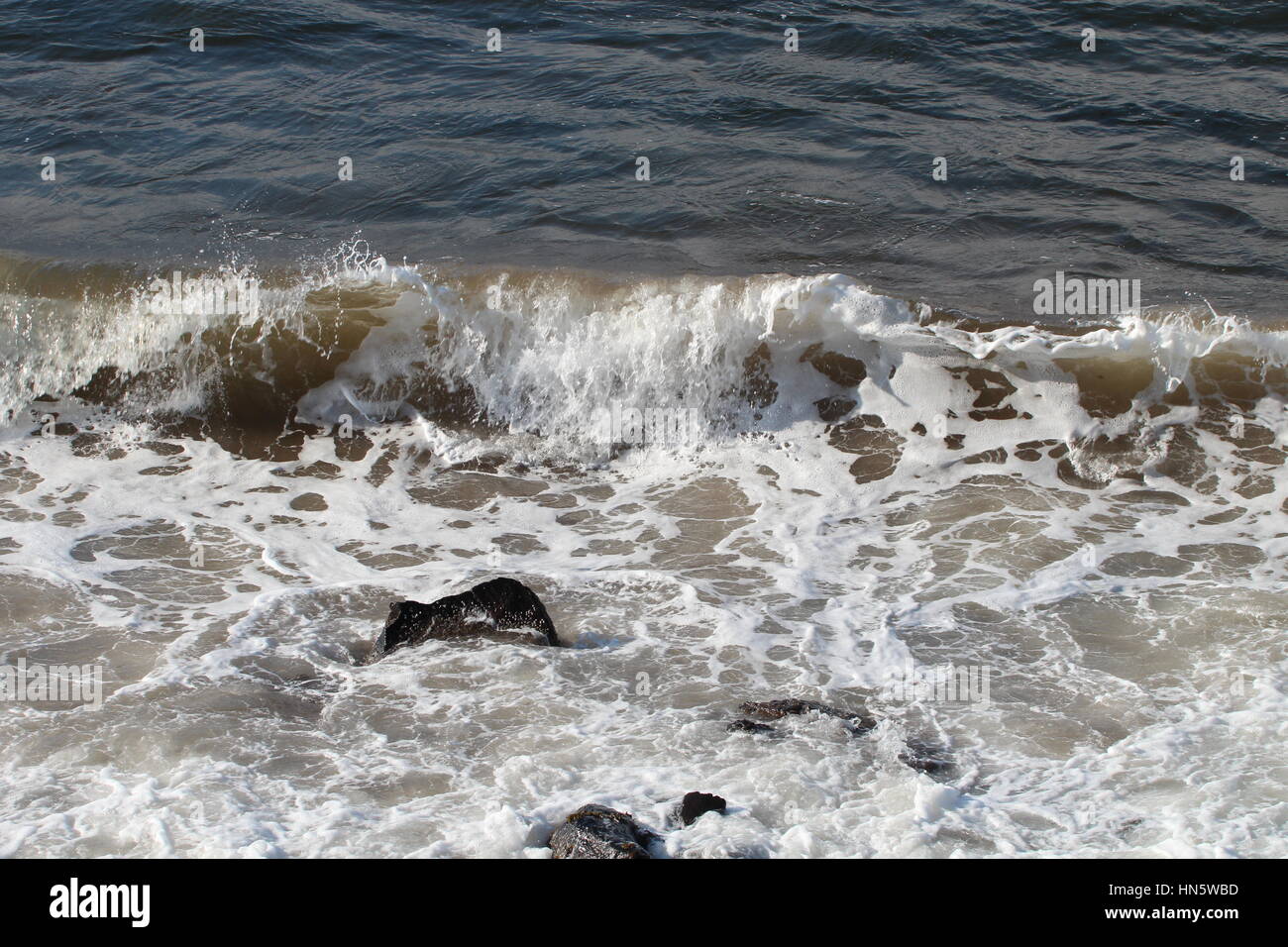 Tidal shoreline waves hi-res stock photography and images - Alamy