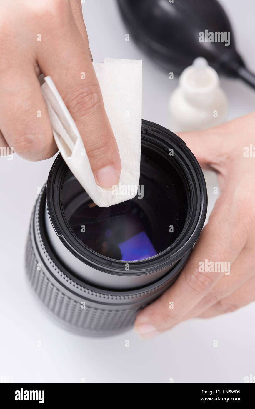 closeup the hand cleaning dirty lens Stock Photo - Alamy