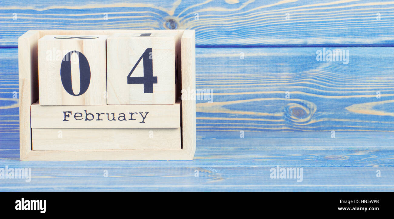 Vintage photo, February 4th. Date of 4 February on wooden cube calendar ...