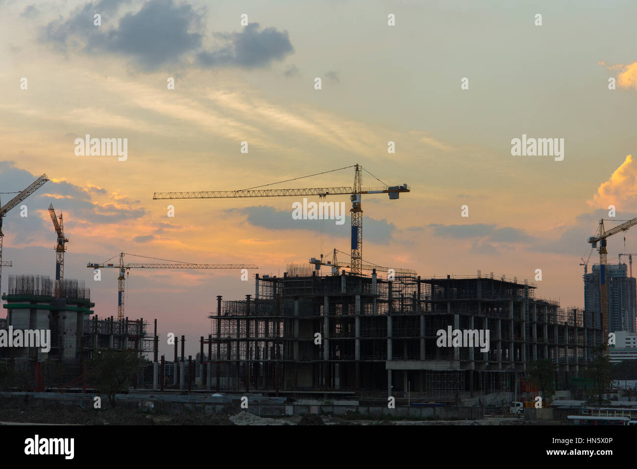 Construction site at dusk time Stock Photo - Alamy
