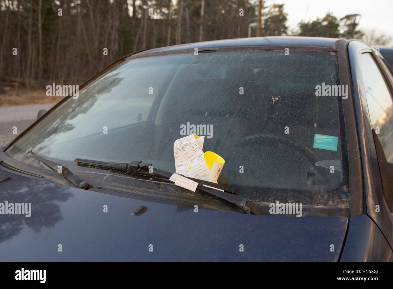 A car with parking ticket Stock Photo - Alamy