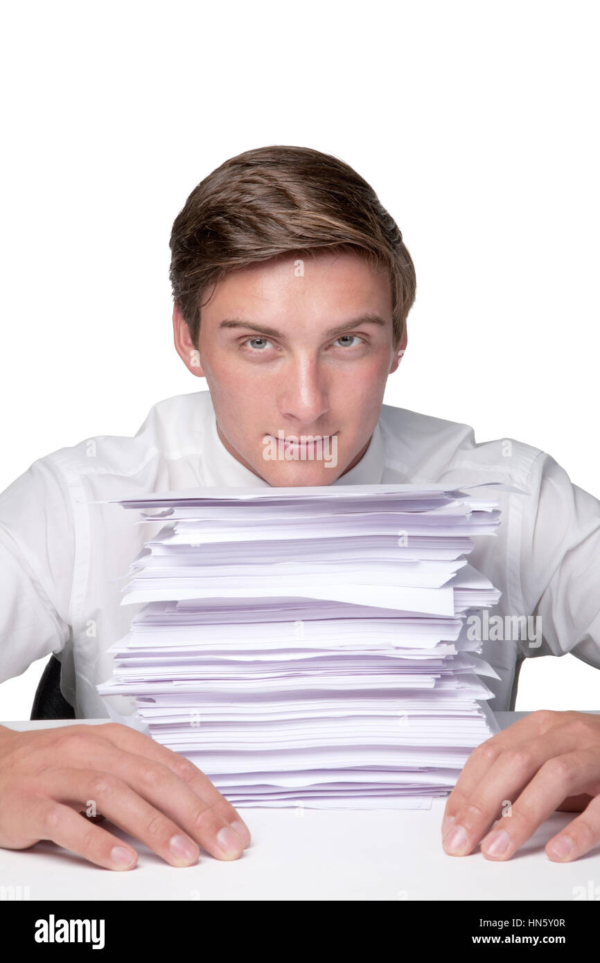 business man overloaded with paper work sitting at his desk Stock Photo ...