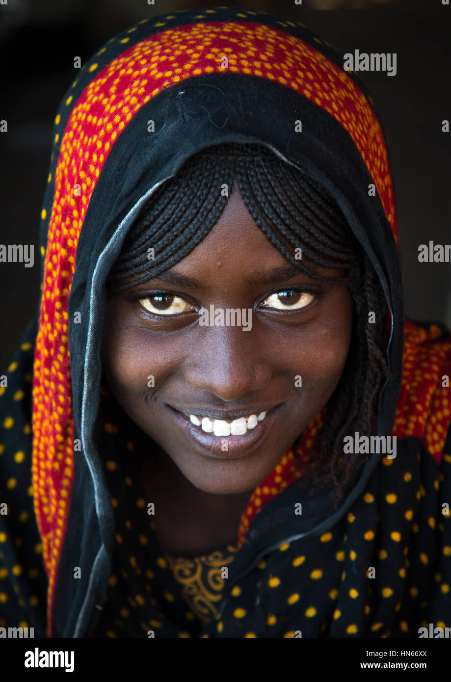 Portrait Of A Smiling Afar Tribe Teenage Girl With Braided Hair Afar