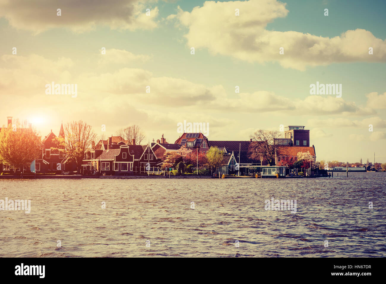 Comfortable houses at sunset Stock Photo - Alamy