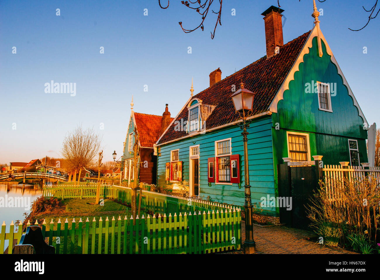 Comfortable houses at sunset Stock Photo - Alamy