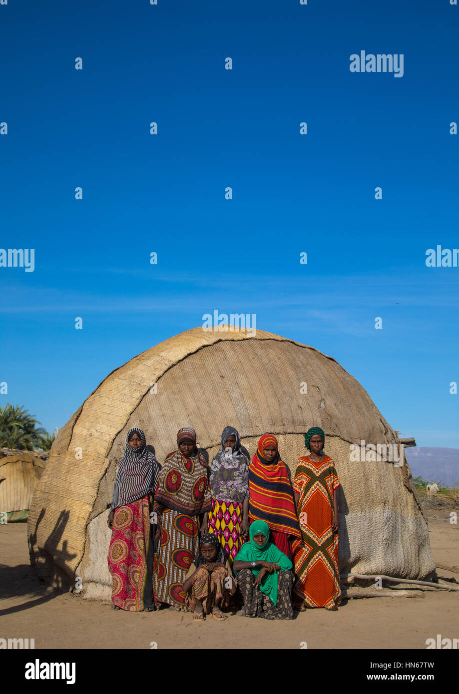 Portrait of Afar tribe women in front of their traditional hut, Afar ...