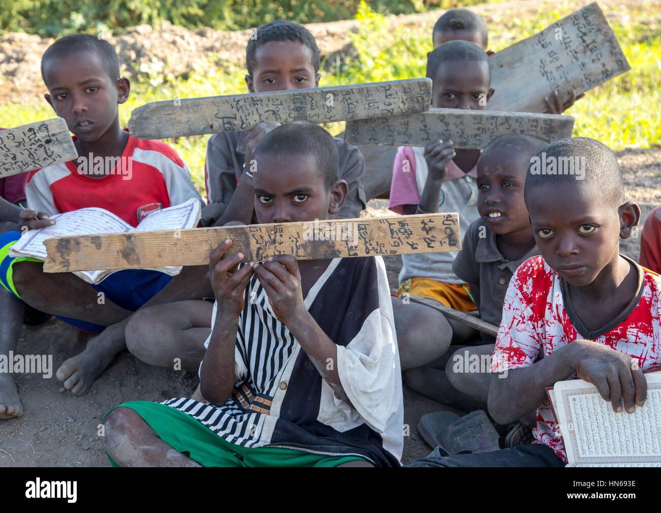 Afar tribe children with wood boards in a coranic school, Afar region ...