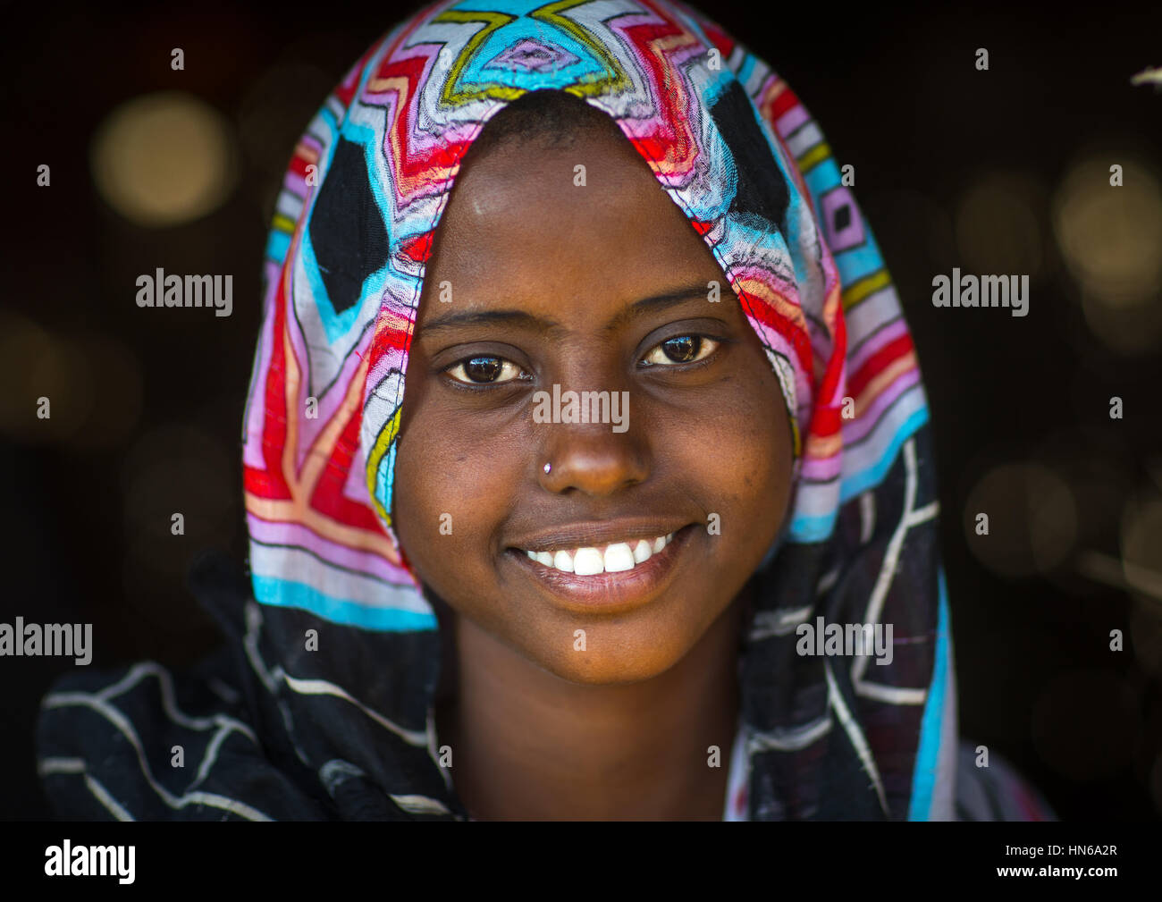 Portrait of a smiling Afar tribe girl, Afar region, Afambo, Ethiopia ...