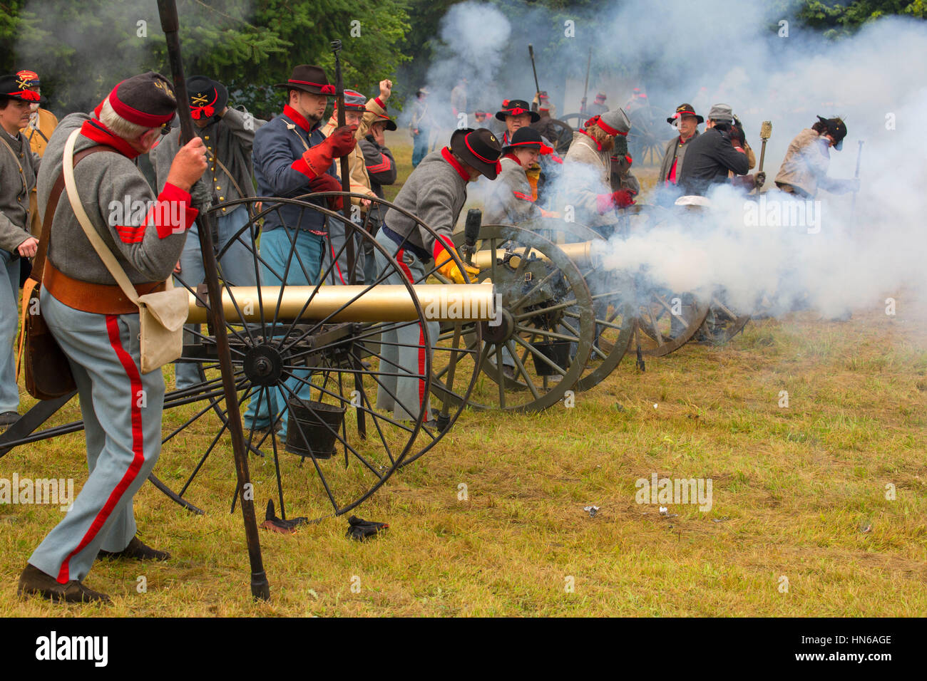 Confederate cannon battery during battle re-enactment, Civil War ...