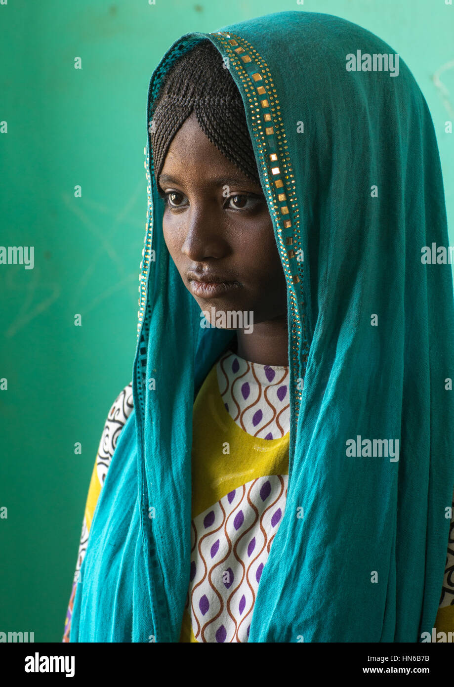 Portrait Of An Afar Tribe Girl With Braided Hair And A Blue Veil Afar