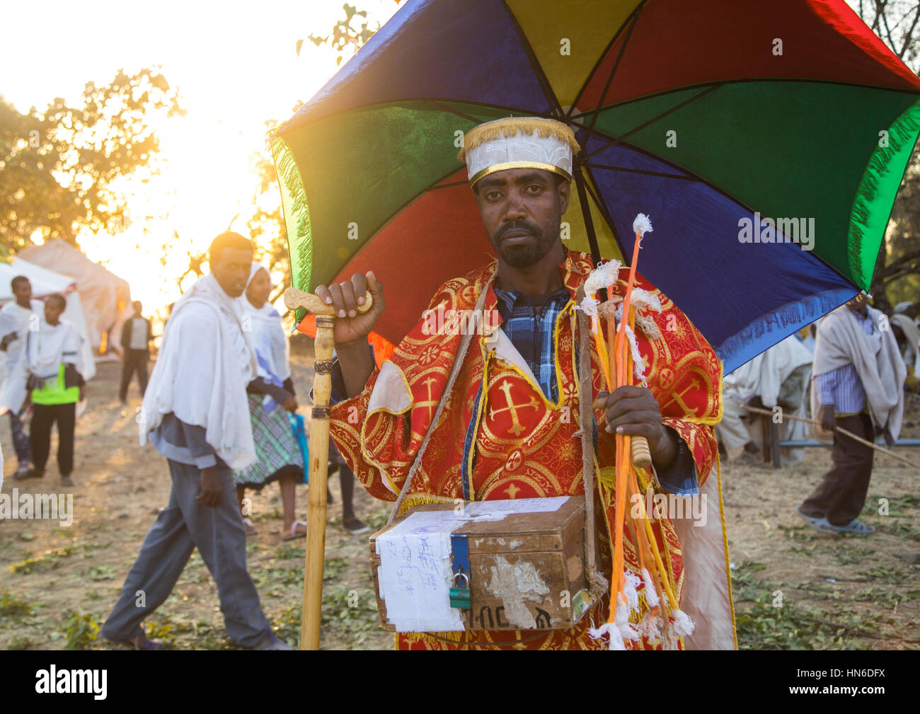 Ethiopian orthodox priest celebrating the colorful Timkat epiphany ...