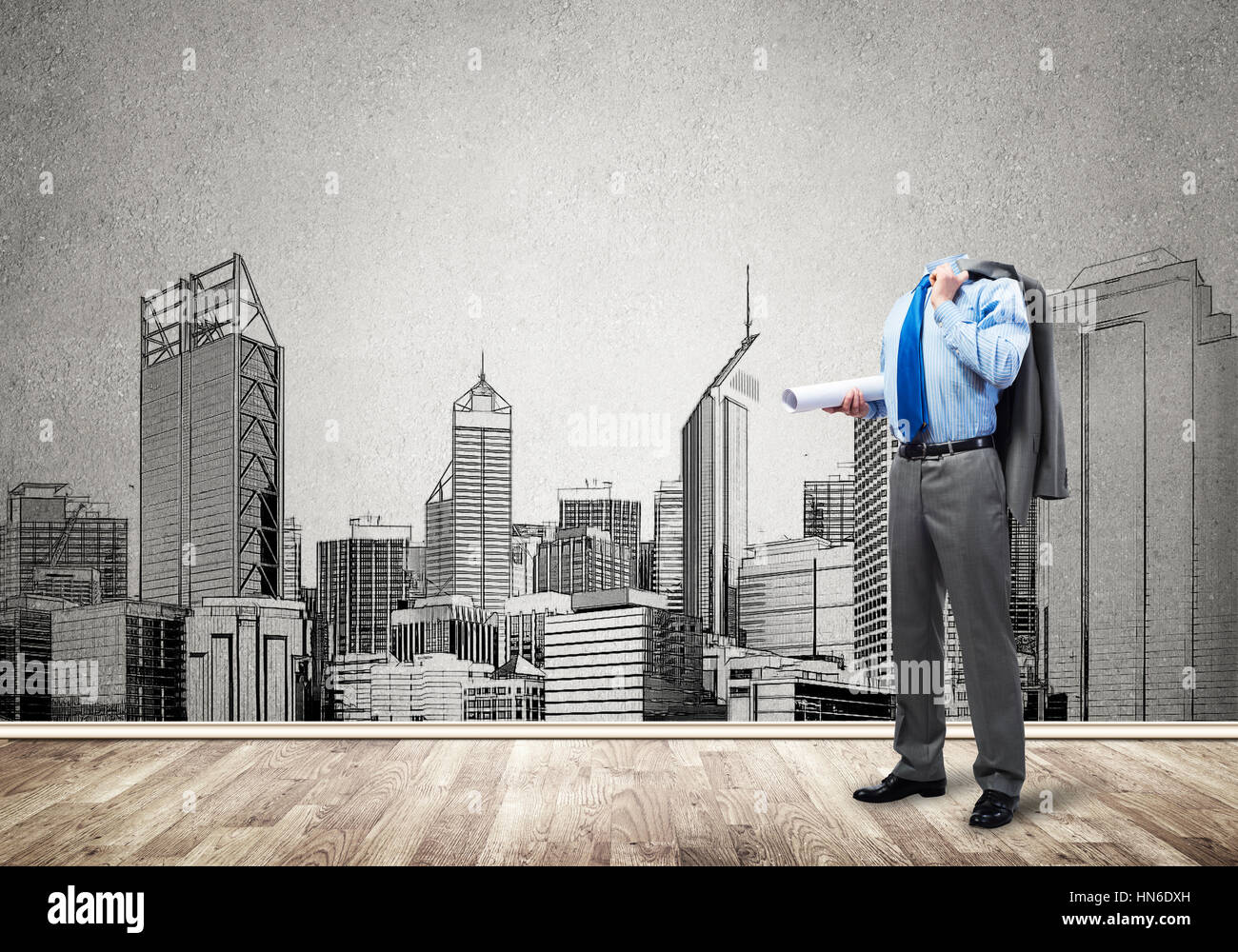 Headless engineer man with papers in hand against construction ...