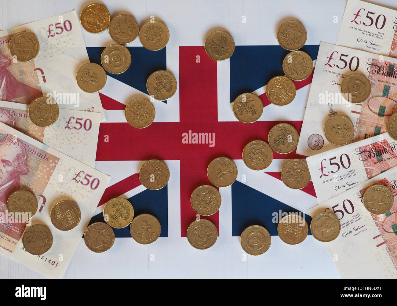 Pound coins and banknotes money (GBP), currency of United Kingdom, over ...