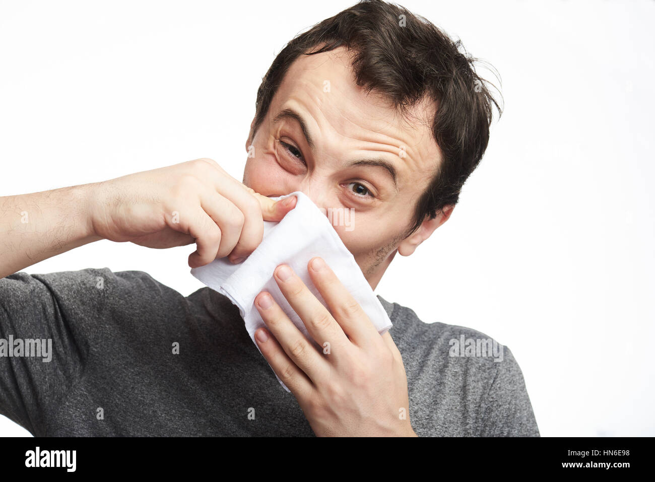 young man with flu isolated on white background Stock Photo - Alamy