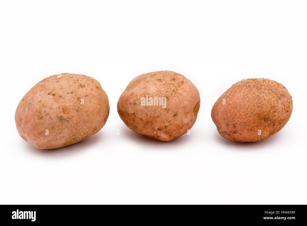 Quality of potatoes bellarosa. isolated on white backgr Stock Photo - Alamy