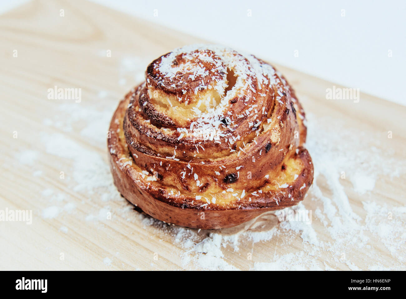 Cinnamon roll swirl bun with coconut Stock Photo - Alamy