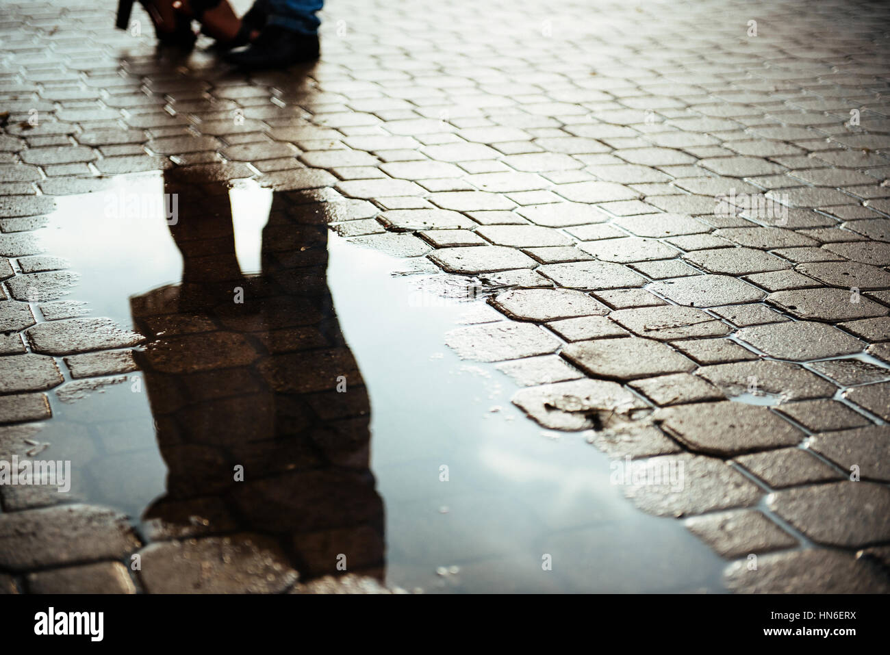 Couple water puddle reflection hi-res stock photography and images - Alamy