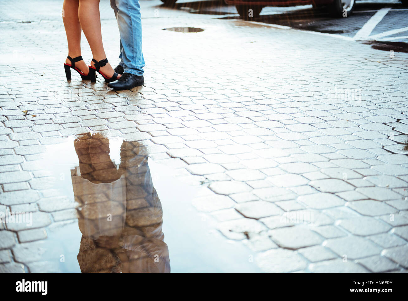Couple water puddle reflection hi-res stock photography and images - Alamy