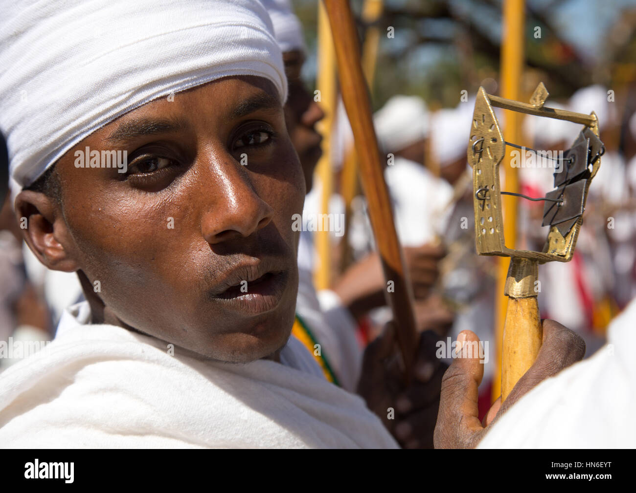 Ethiopian orthodox priest with a sistrum rattle celebrating the ...
