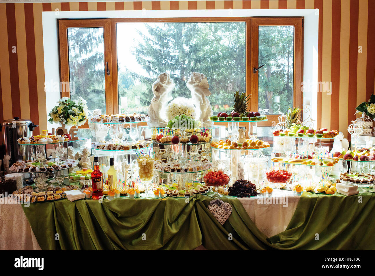 Good exquisite buffet table at a solemn event Stock Photo - Alamy