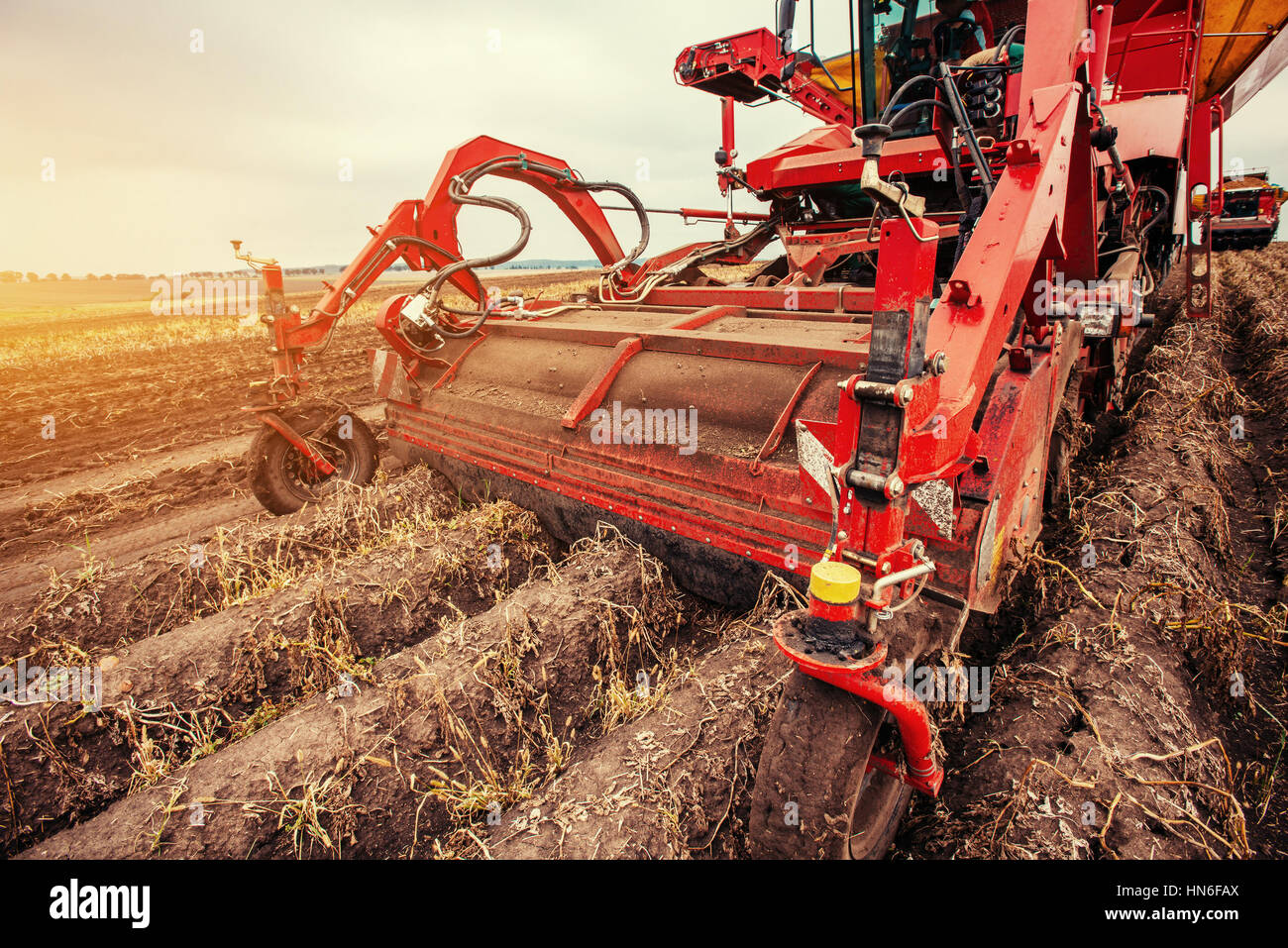 Farming tractor trailer plowing working hi-res stock photography and ...