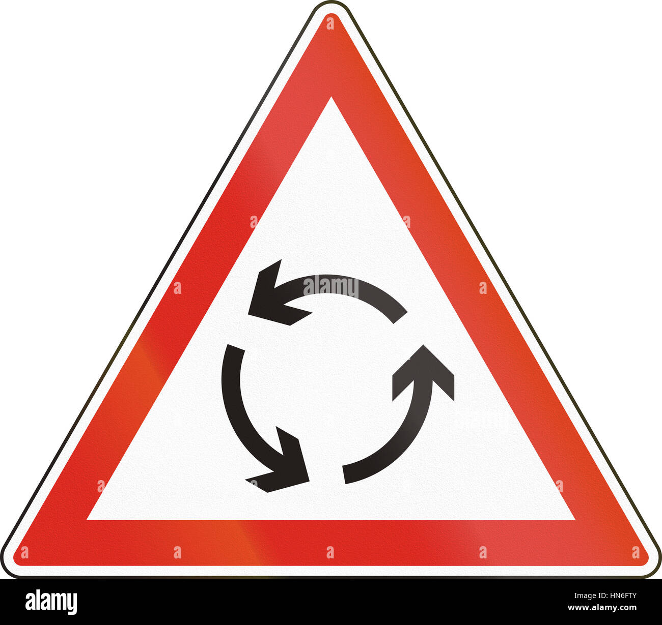 Warning road sign used in Hungary - Roundabout warning Stock Photo - Alamy
