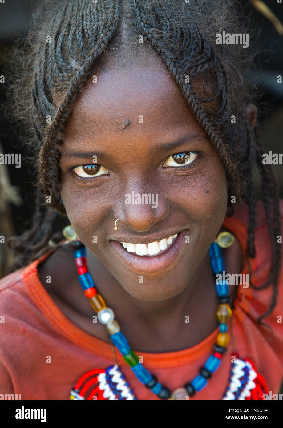 Portrait Of A Smiling Afar Tribe Girl With Braided Hair Afar Region