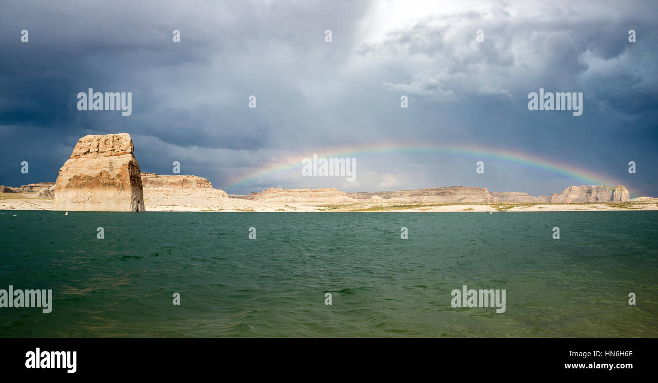 Lone Rock with rainbow, Lake Powell, Utah, USA Stock Photo - Alamy