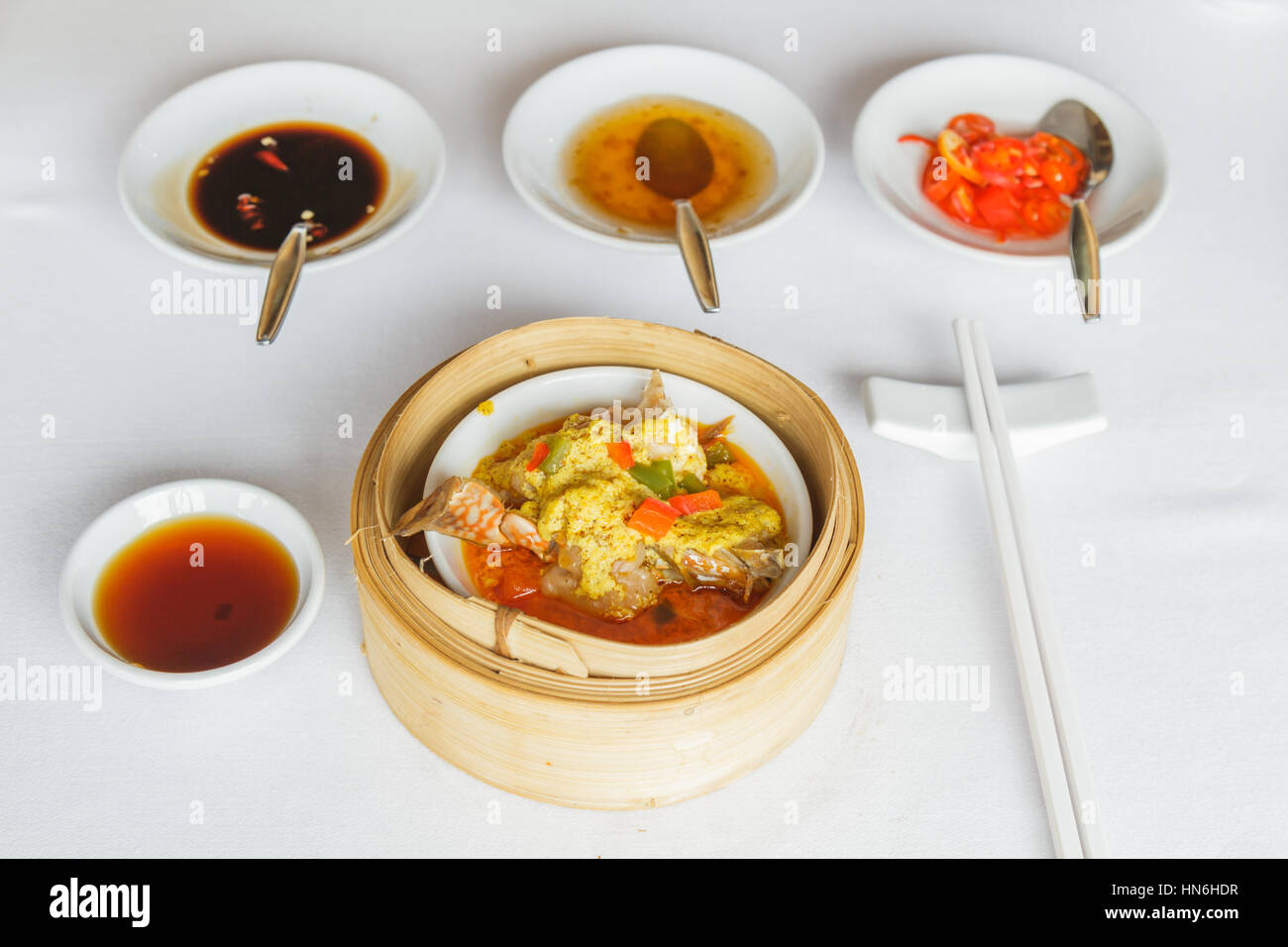 Dim sum food Steamed crab skiff with curry in bamboo basket at ...