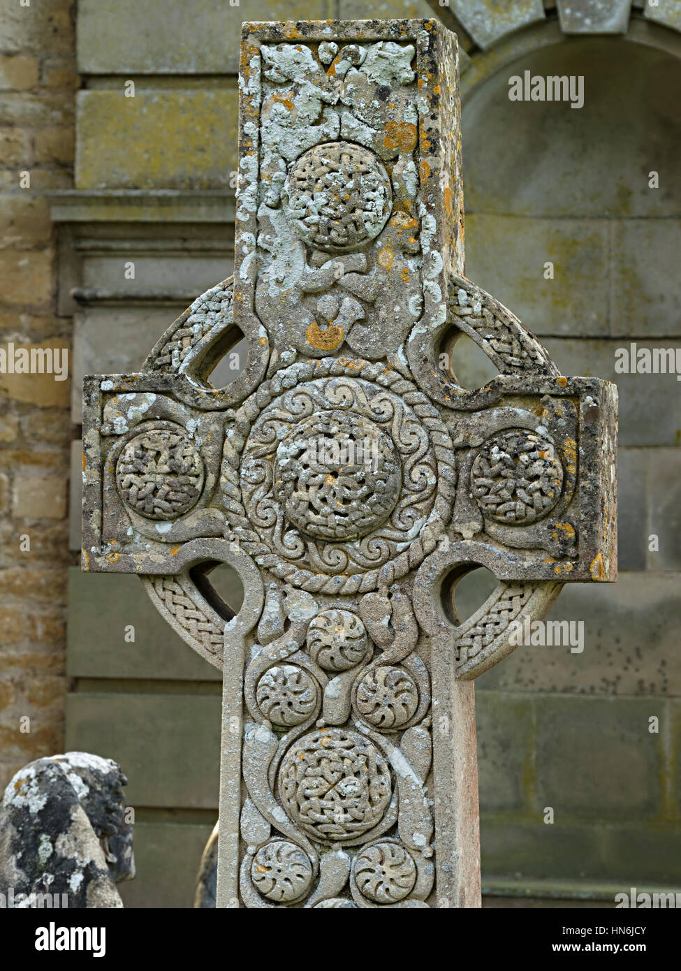 Ornate stone Celtic Cross headstone in graveyard of St Mary Magdalene ...