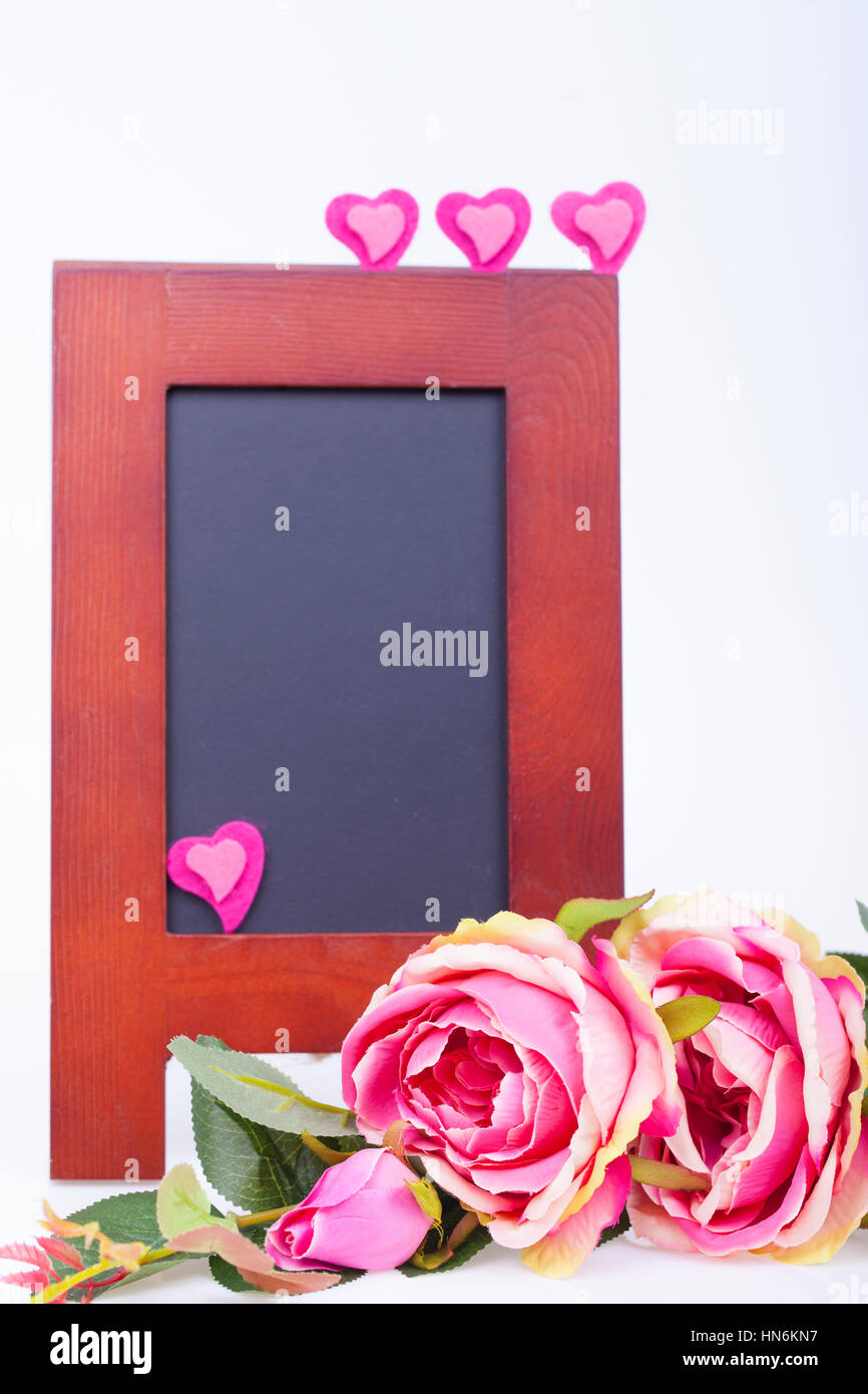 Pink rose, pink hearts and writing board on a white background Stock ...