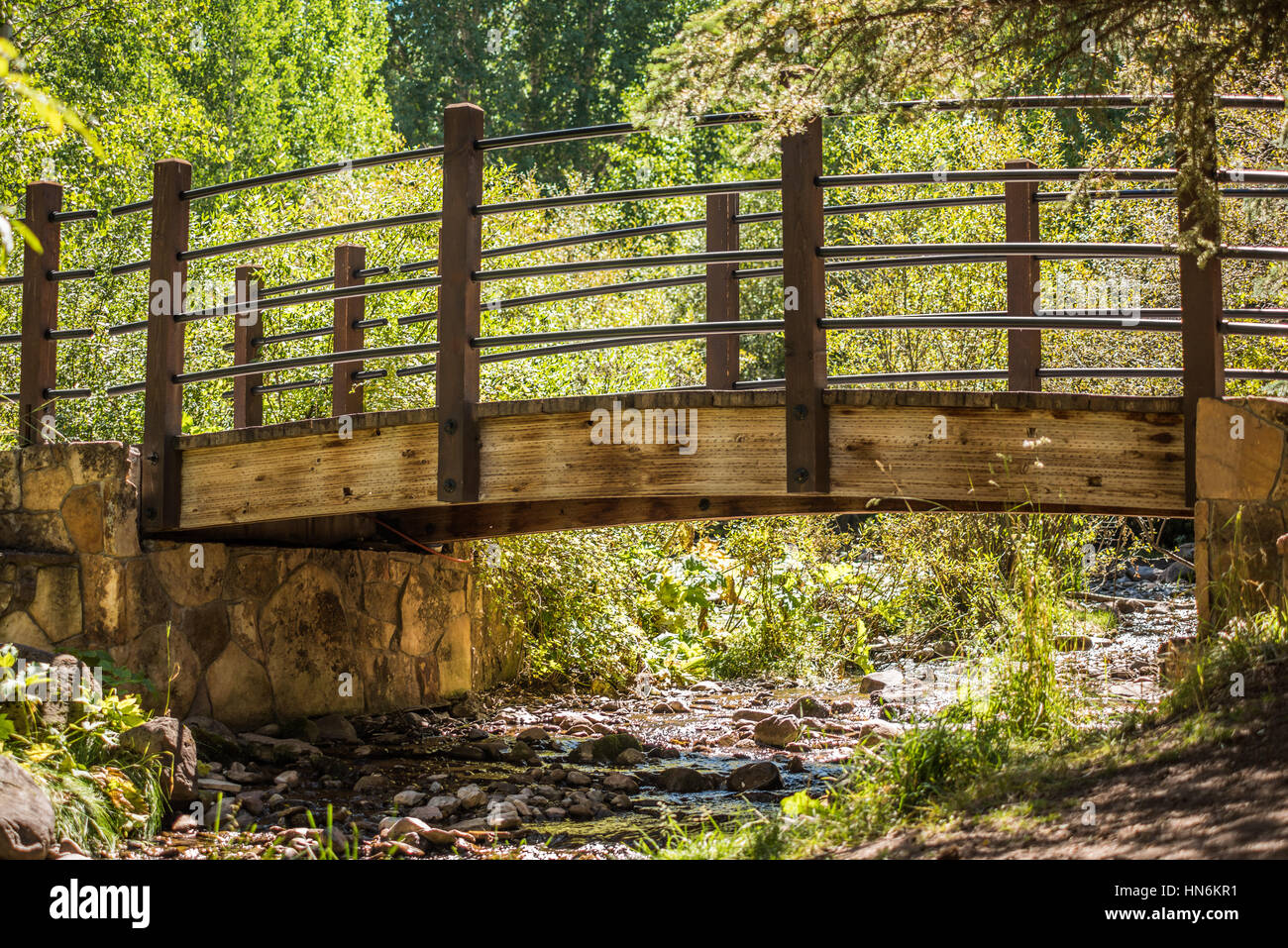 Small fairytale bridge with creek in Vail, Colorado during summer Stock ...