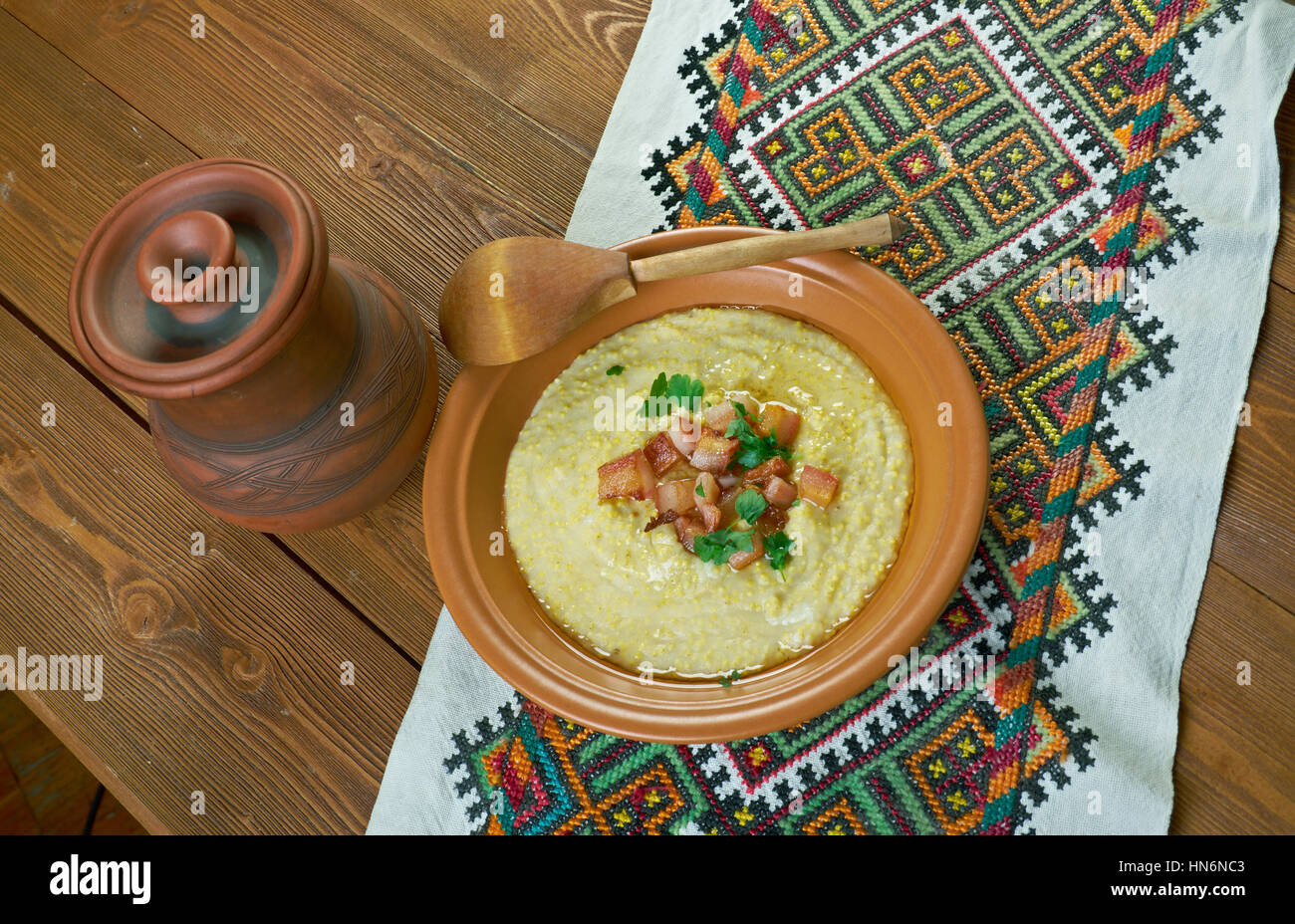 Kulescha - Carpathian porridge with corn and millet grains Stock Photo ...